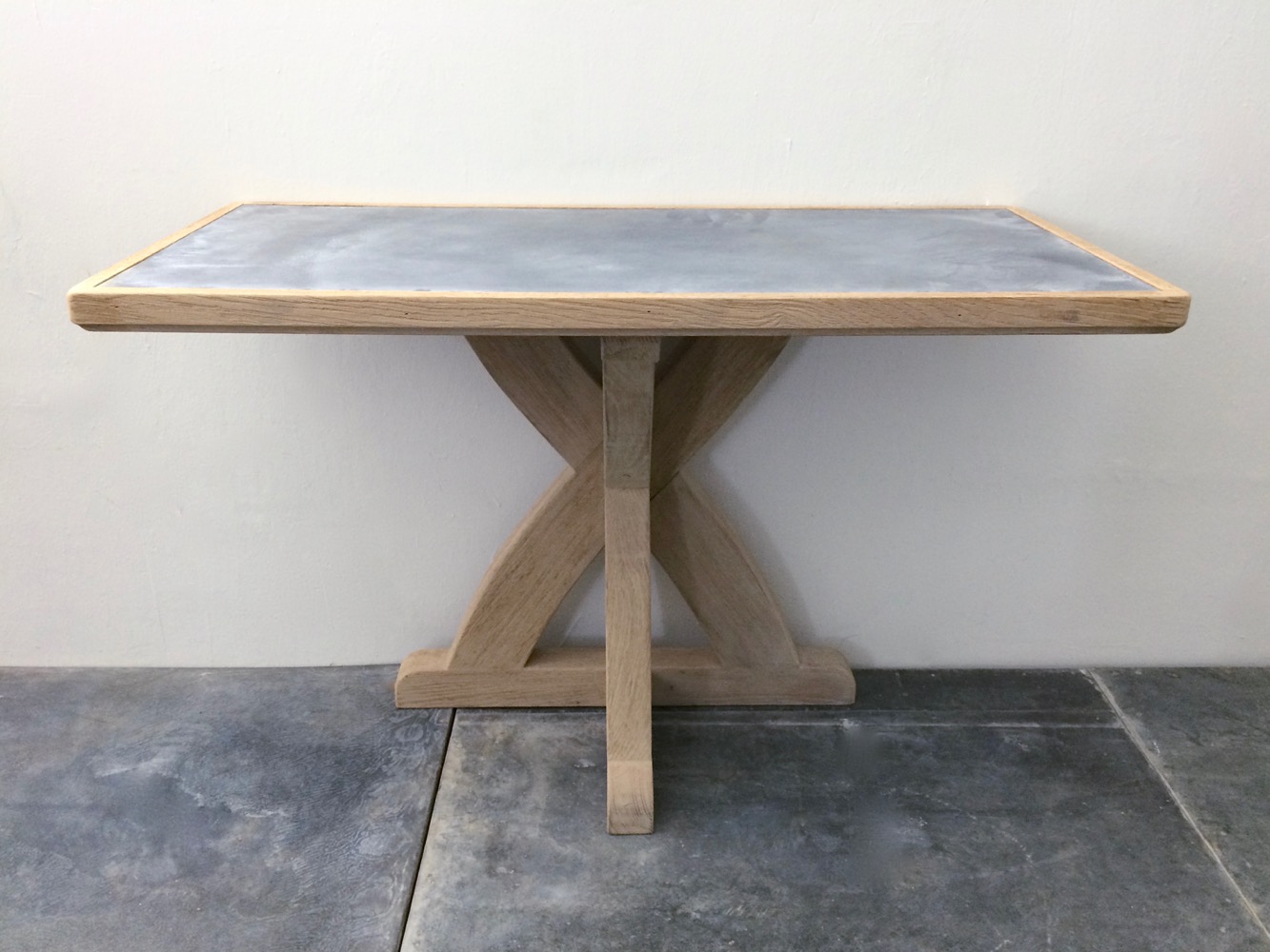 The Sawbuck Table